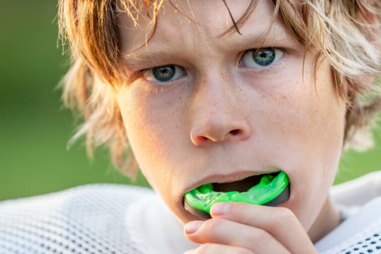 Do Teens with Invisalign in Greensboro Need Mouthguards for Sports?